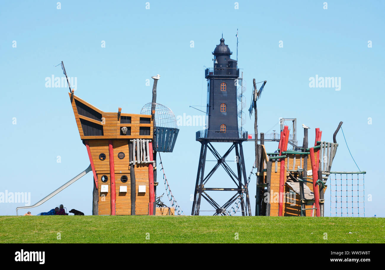 Playground and lighthouse obereversand hi-res stock photography and ...