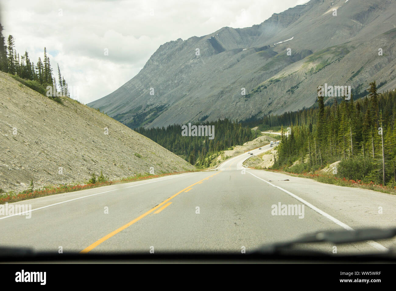 On the way on Canadian streets, view through the windscreen, in front ...
