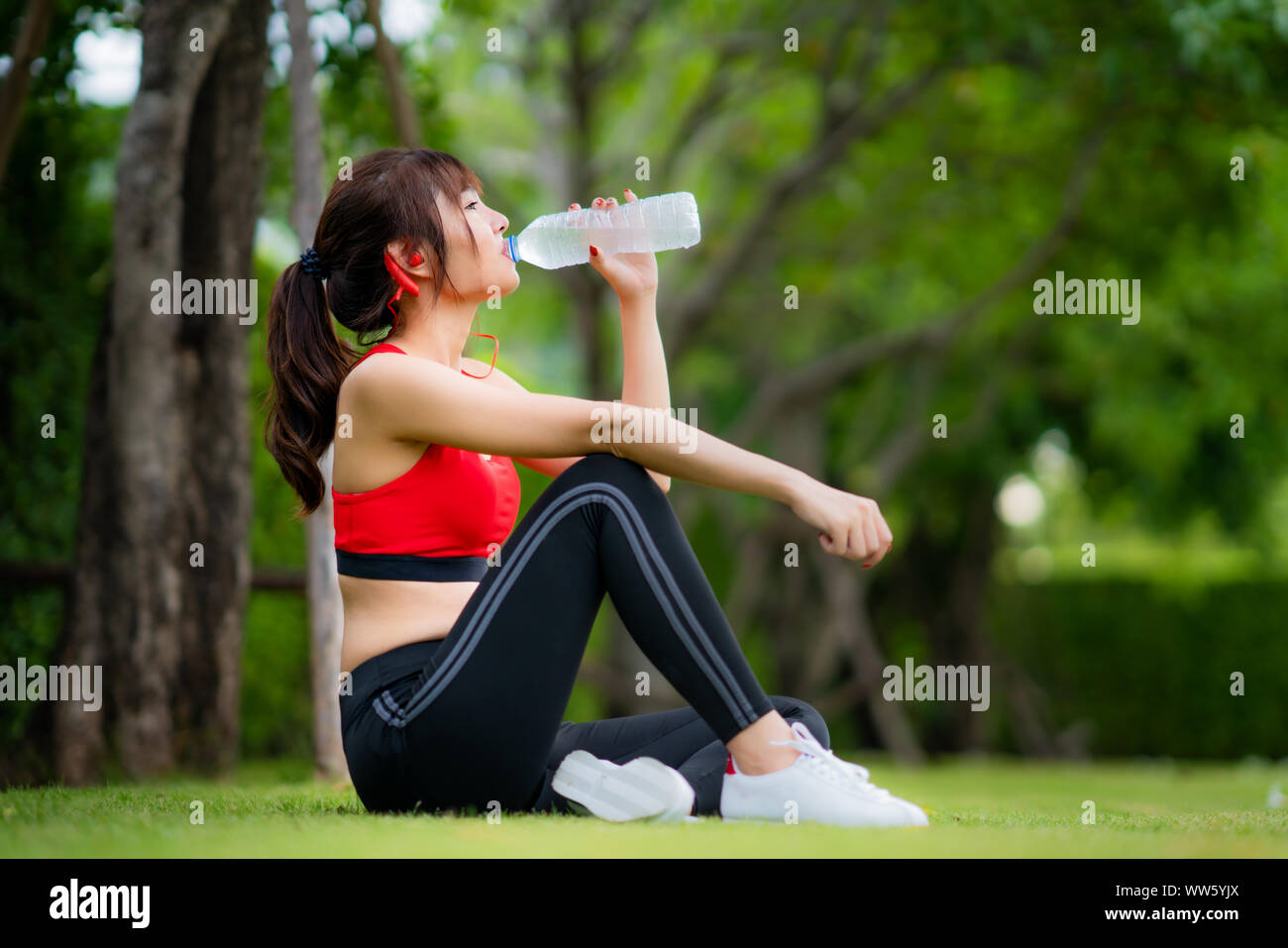 Drinking mineral water from bottle hi-res stock photography and images ...