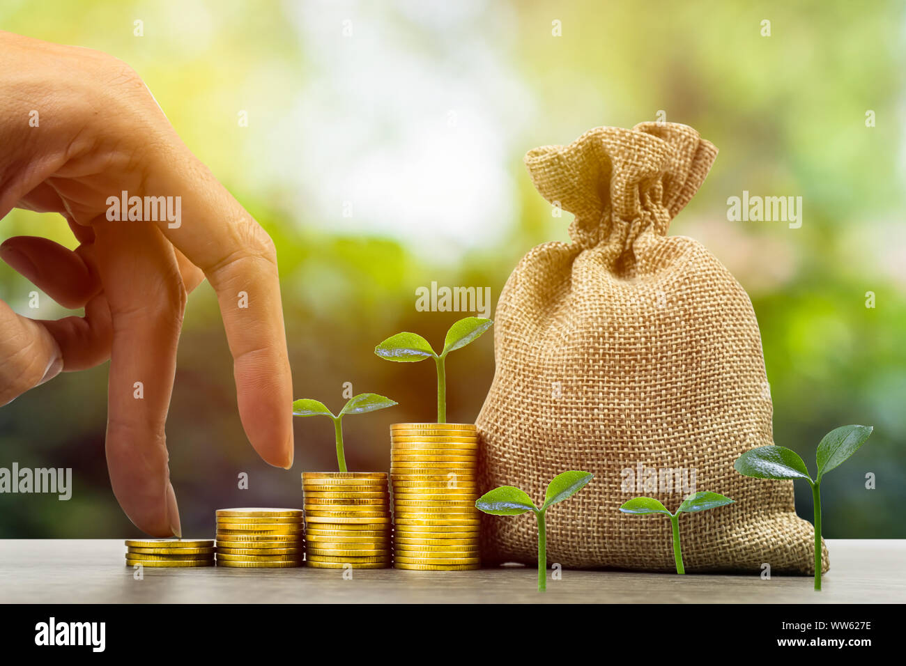 Making money and money investment, Savings concept. A man hand on ...