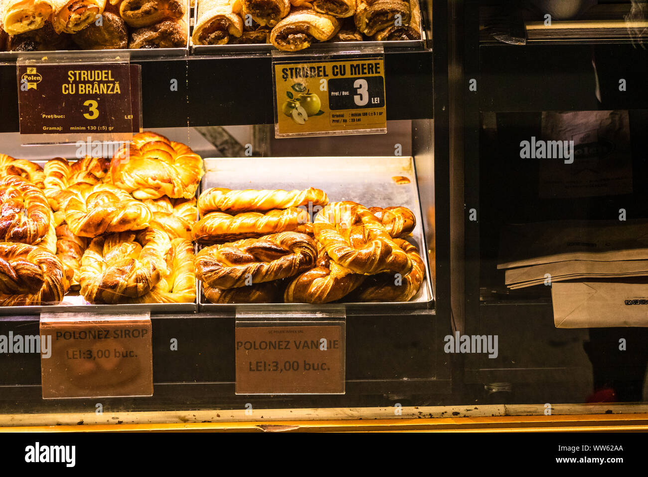 Customer buying fresh baked pastry from a bakery shop in the North ...