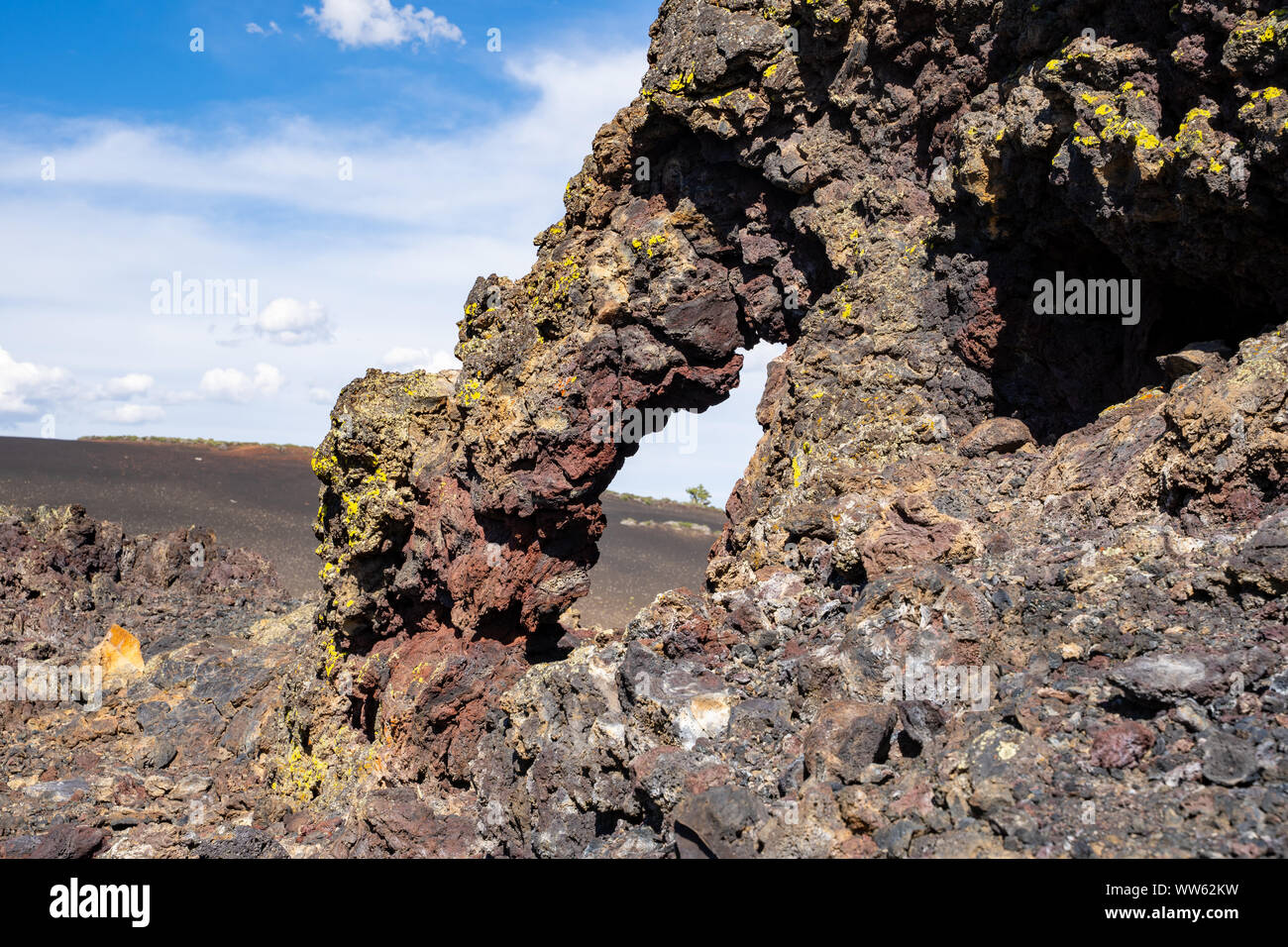 Colorful arch formation in volcanic rock at Craters of the Moon ...