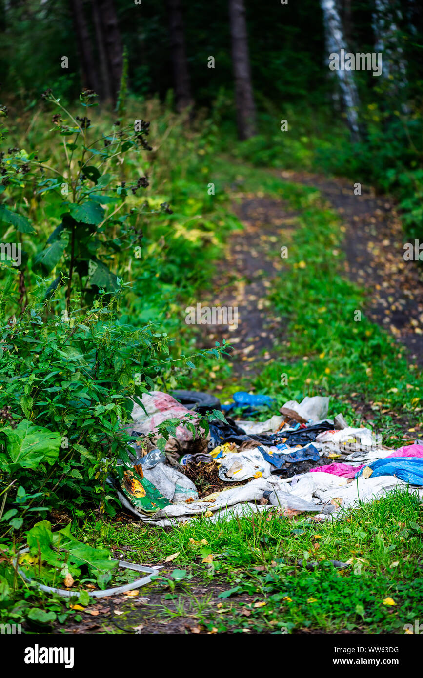 Big rubbish dump in the forest Stock Photo - Alamy