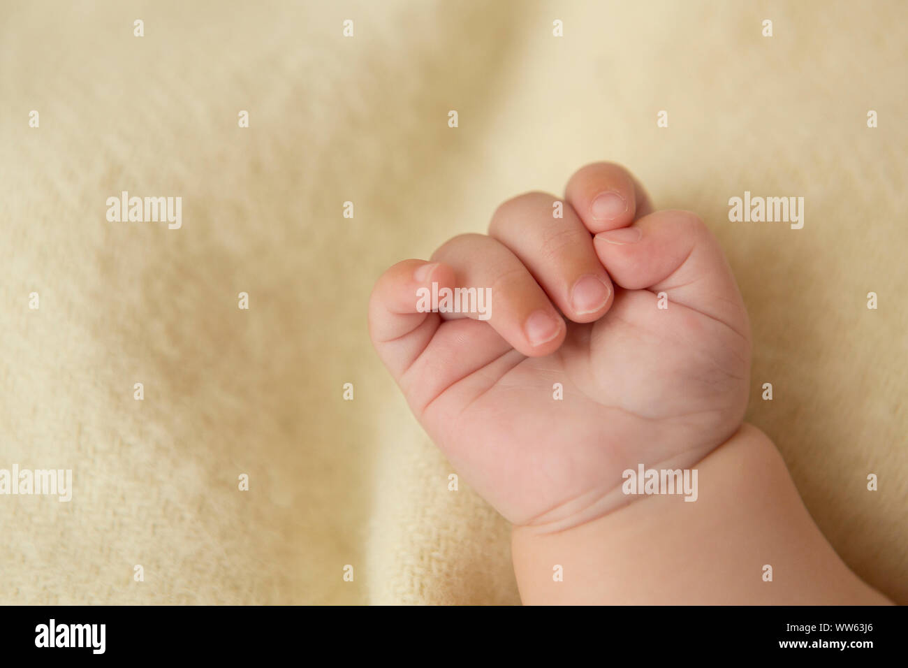 Baby hand hi-res stock photography and images - Alamy