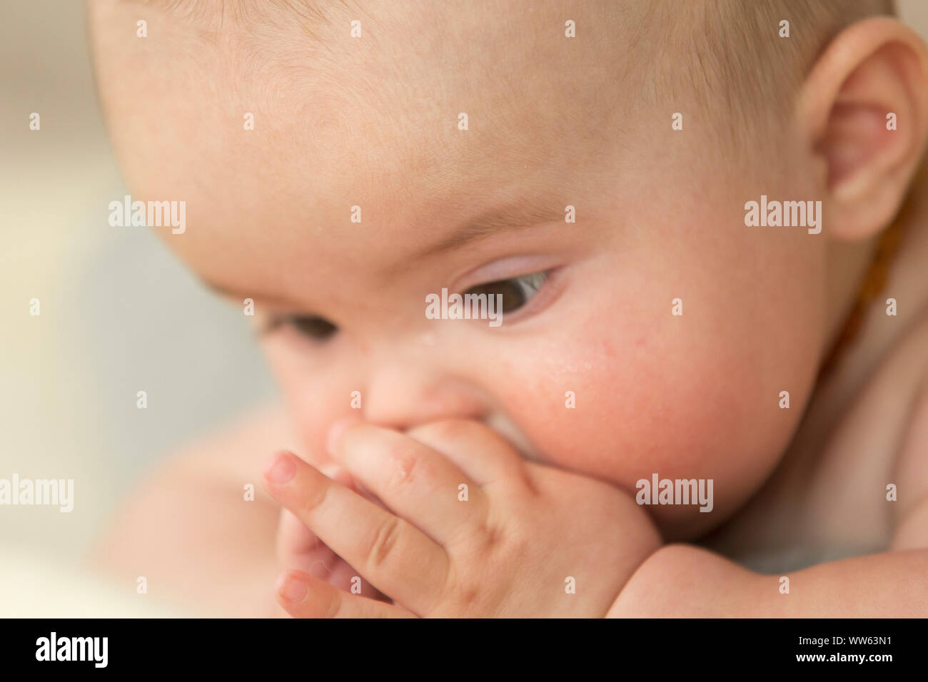 Baby is lying prone, detail Stock Photo - Alamy
