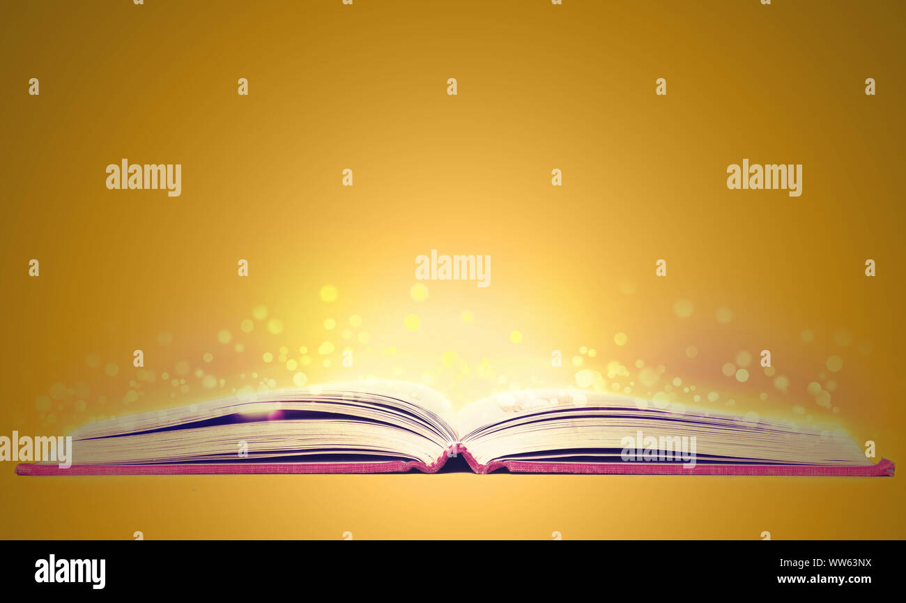 Yellow Background book with sparks coming out - imagination and reading ...