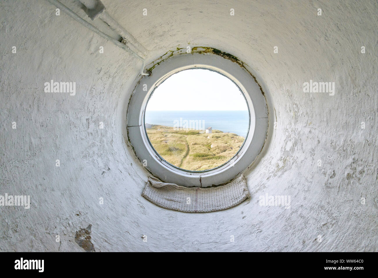View at the coast through the window of a lighthouse hi-res stock ...