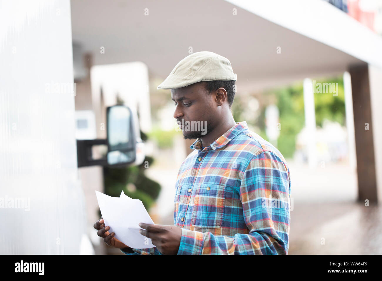 Holding standing looking down transportation hi-res stock photography ...