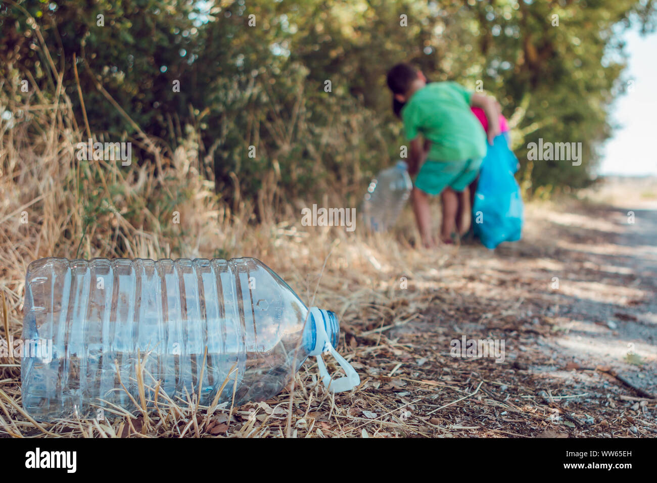Children collecting garbage hi-res stock photography and images - Alamy