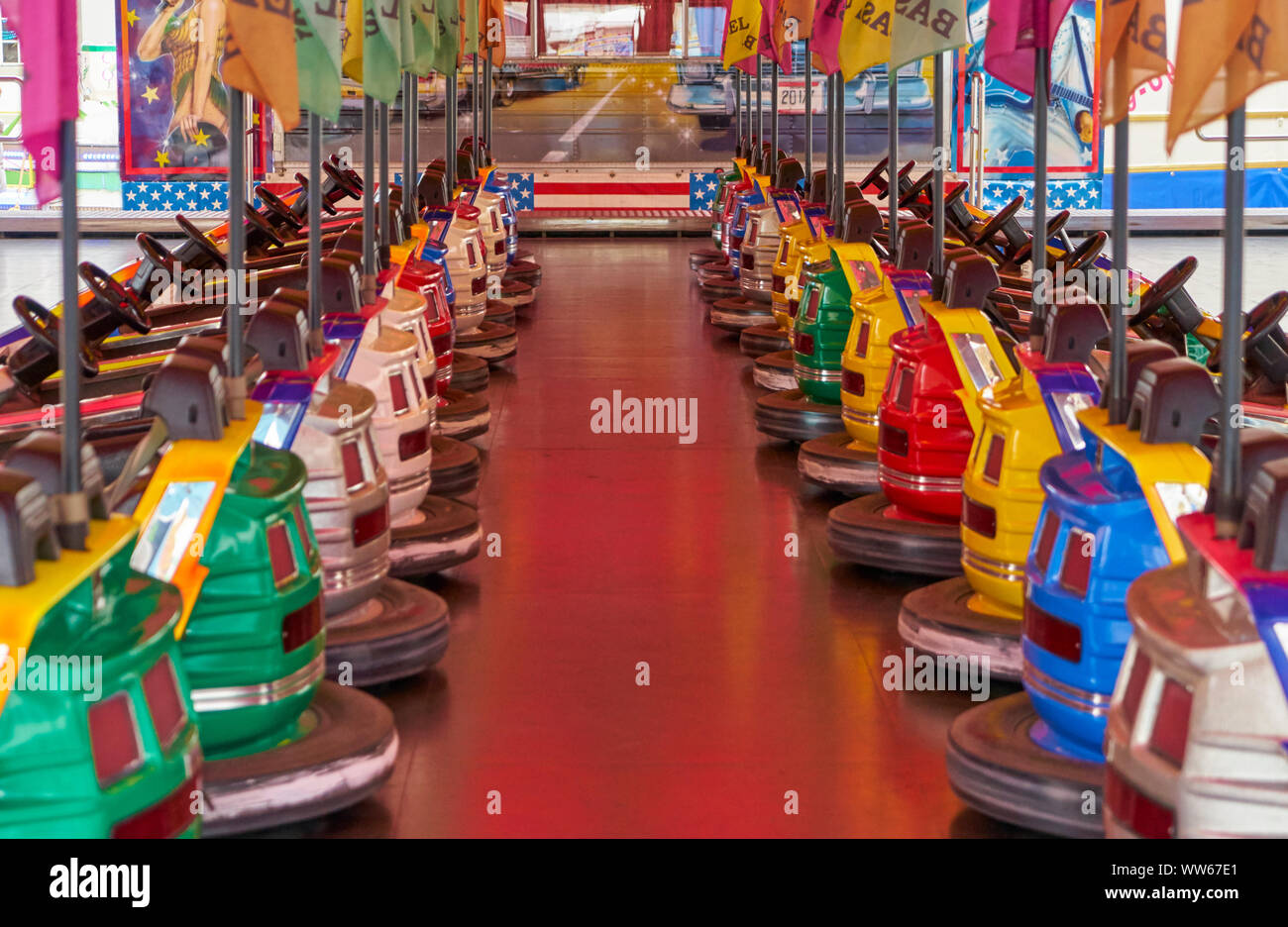 Bumper car, parked in a row and a lane in the middle Stock Photo - Alamy