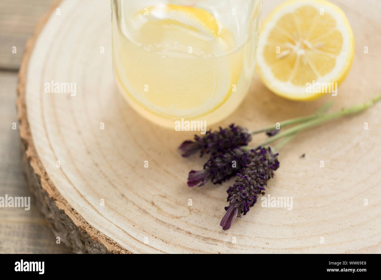 Lavender, lemon, lemonade, tree slice Stock Photo - Alamy