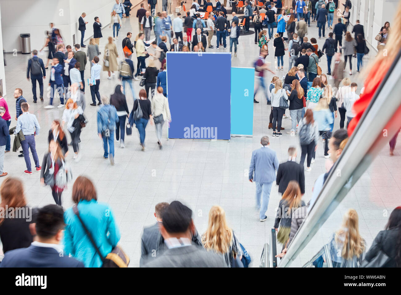 Advertising poster in crowd at event at a trade fair or in a mall Stock ...