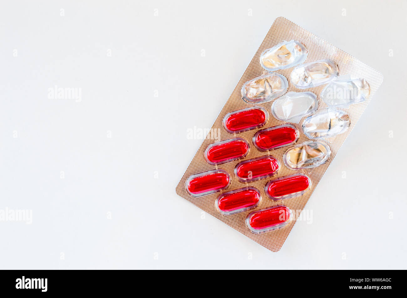 Top view of red capsules on white background. Medication concept Stock ...