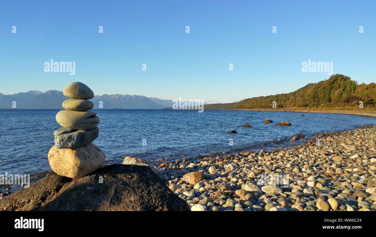 Stone figure, stone male at Stone Beach, New Zealand Stock Photo - Alamy