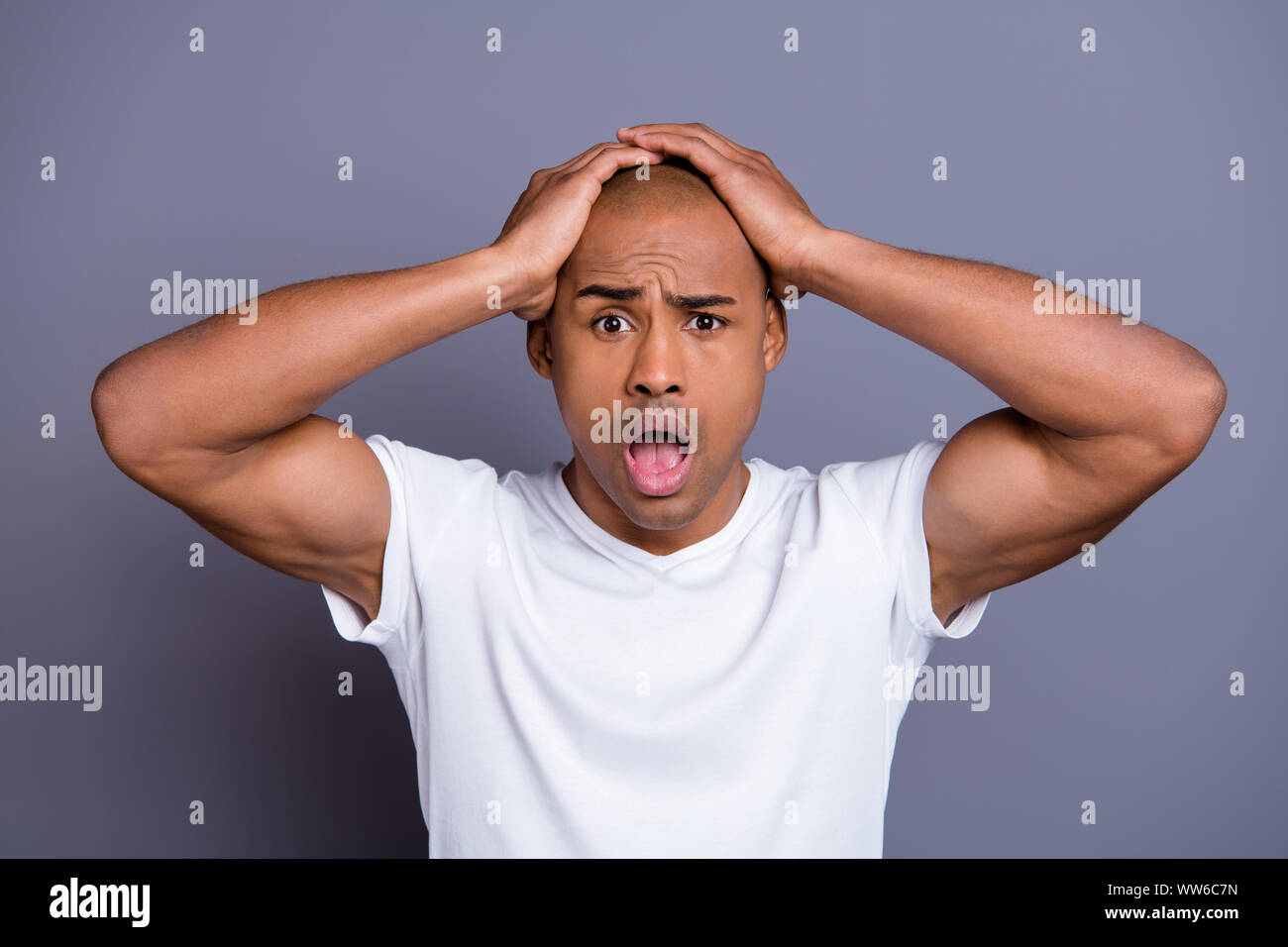 Portrait of nice handsome attractive muscular virile guy wearing white ...