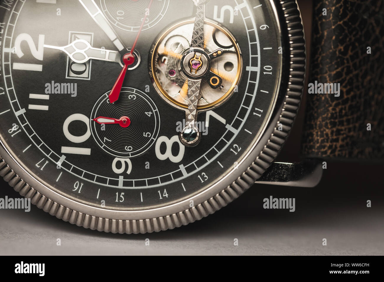 Mechanic luxury wrist watch with automatic winding lay on a table ...