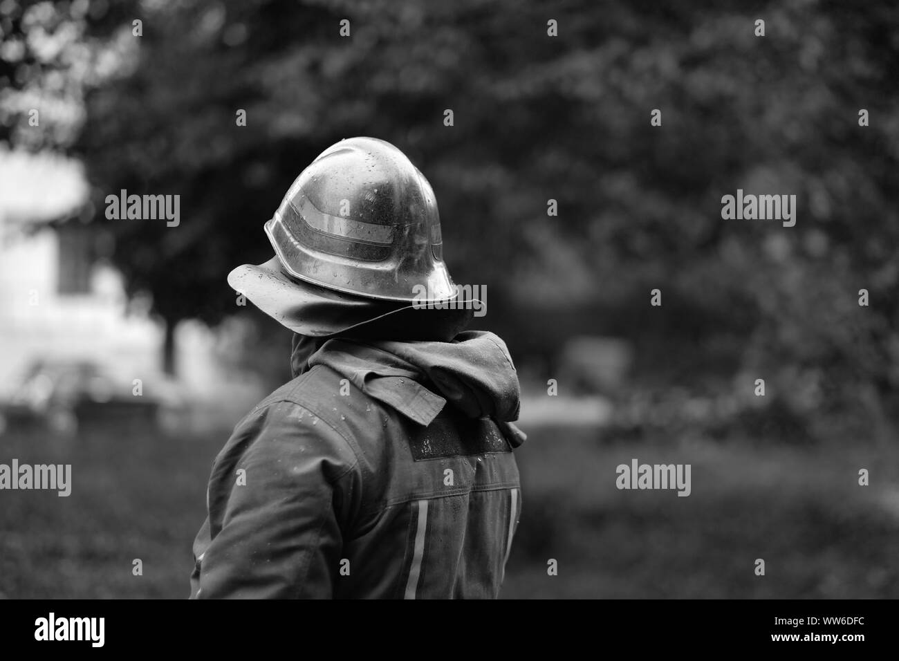 Member of the fire brigade on the spot after the fire suppression Stock ...