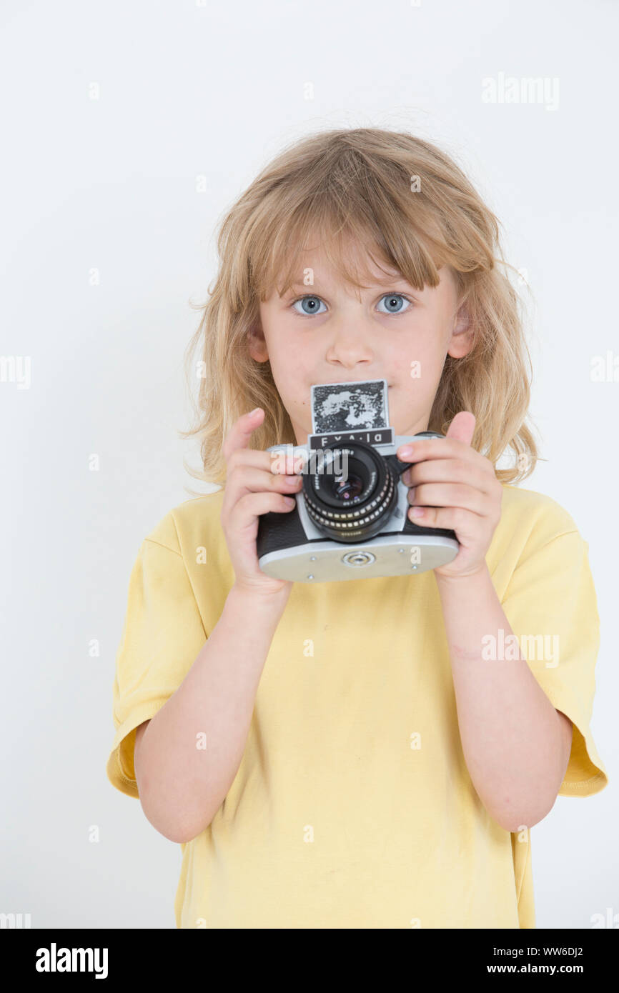 Girl photographed with old camera, portrait Stock Photo - Alamy