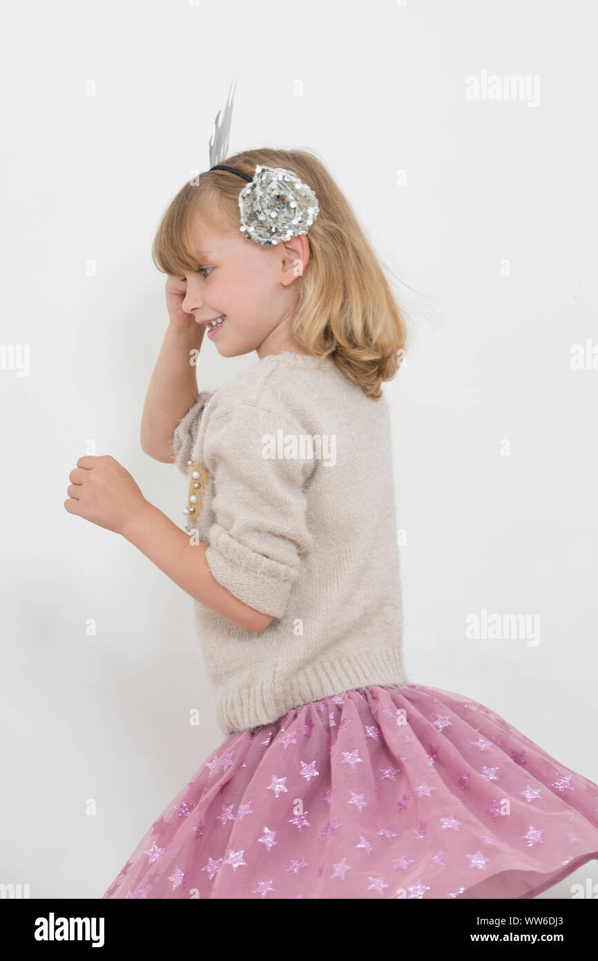 Child while dancing, profile Stock Photo - Alamy