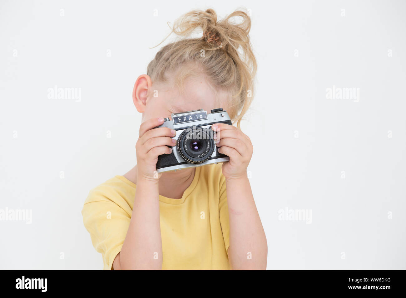 Girl photographed with old camera, portrait Stock Photo - Alamy