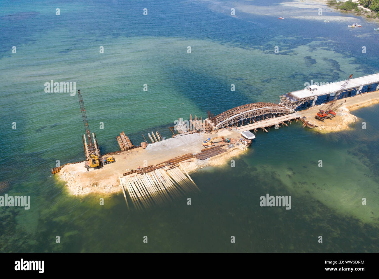 Construction of a bridge across the bay. Construction equipment on the ...