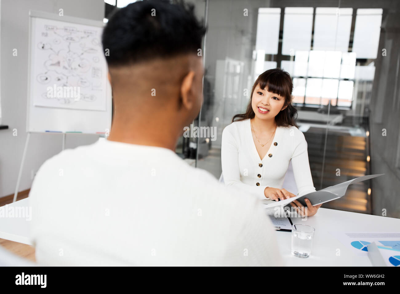 employer having interview with employee at office Stock Photo - Alamy