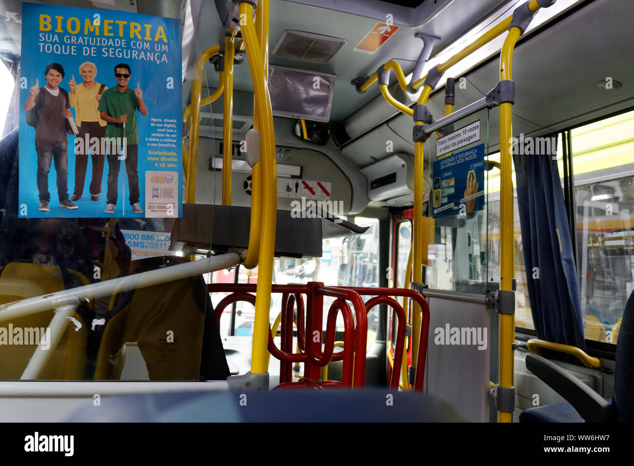 Interior of a Brazilian public transit bus with turnstiles Stock Photo ...