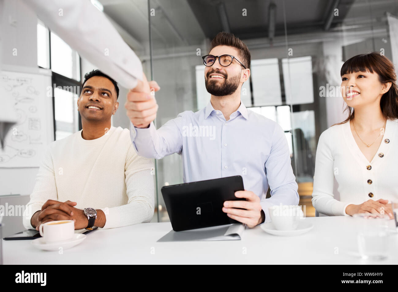 recruiters having interview with employee Stock Photo - Alamy