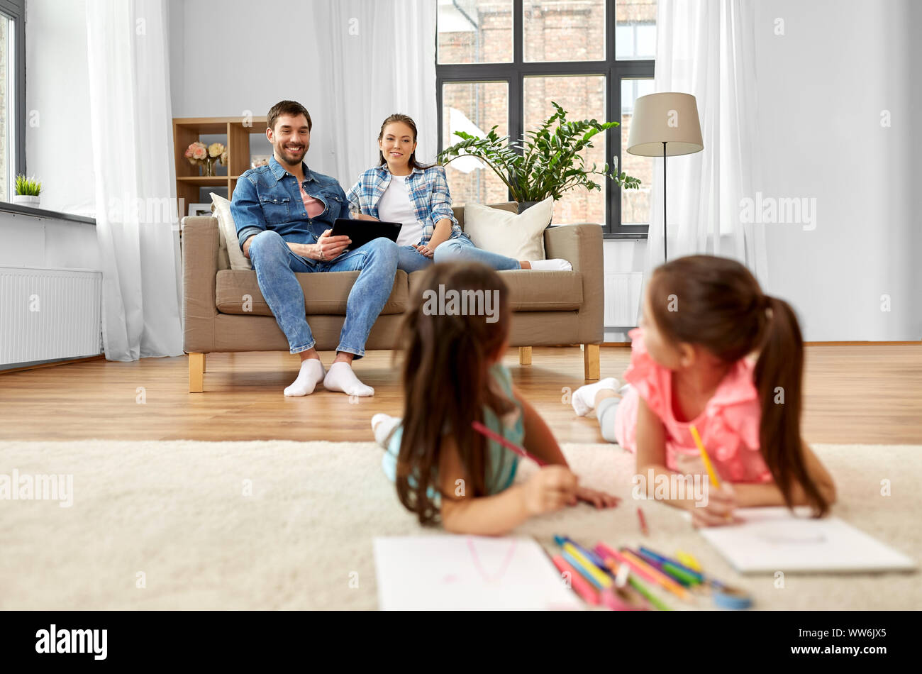 happy family spending free time at home Stock Photo - Alamy