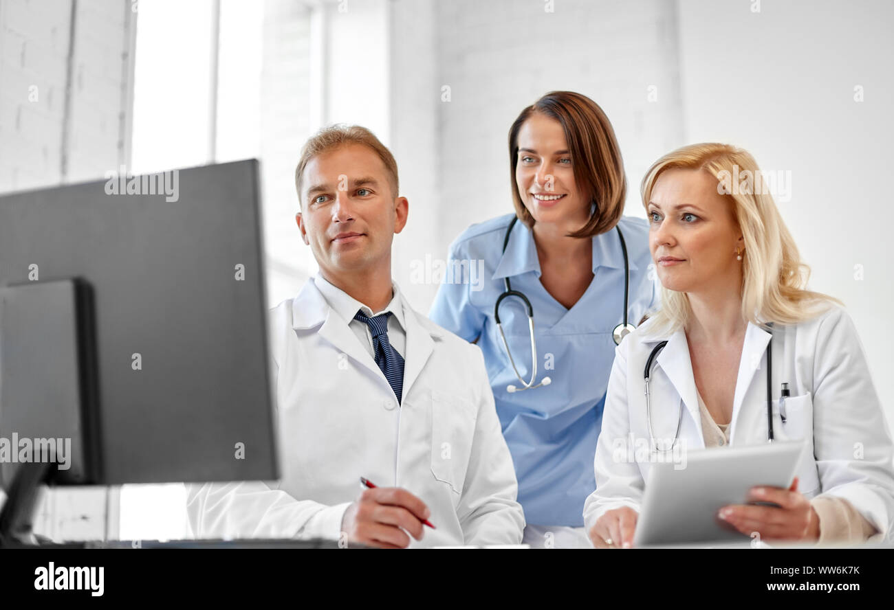 group of doctors with computer at hospital Stock Photo - Alamy
