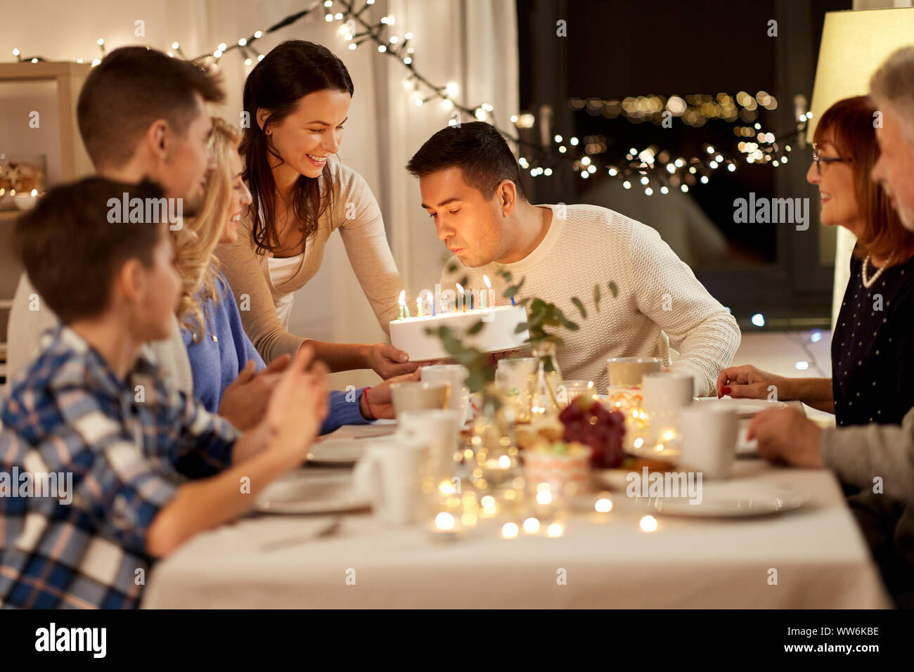 happy family having birthday party at home Stock Photo - Alamy