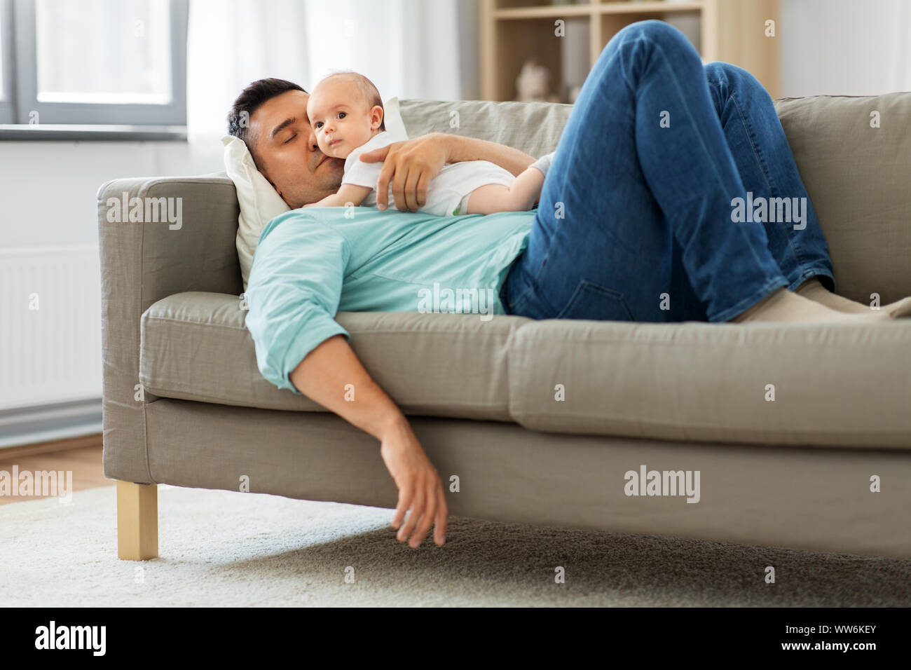 Father daughter sleeping on sofa hi-res stock photography and images ...