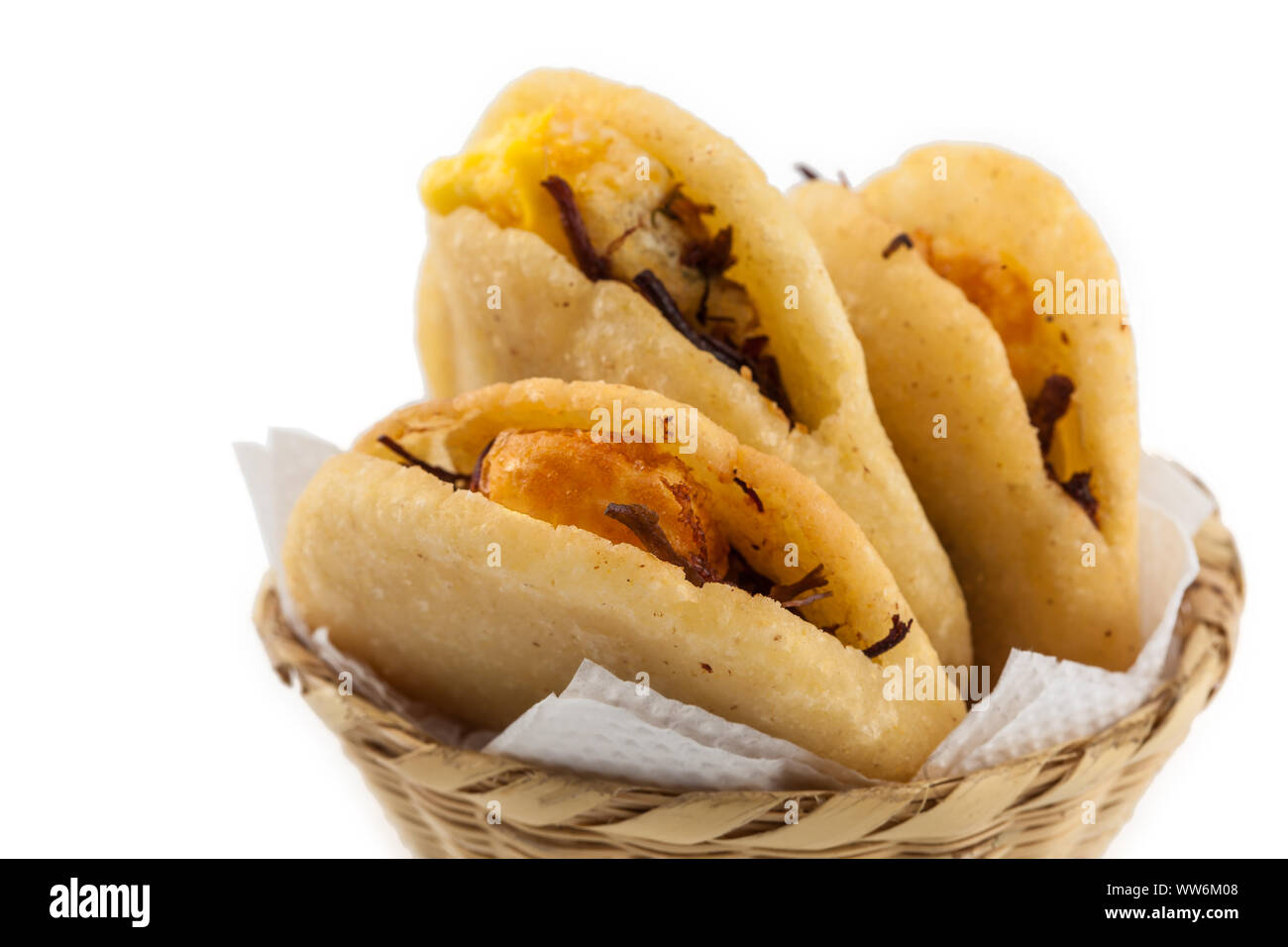 Arepa de huevo. Traditional Colombian fried arepa filled with egg and ...