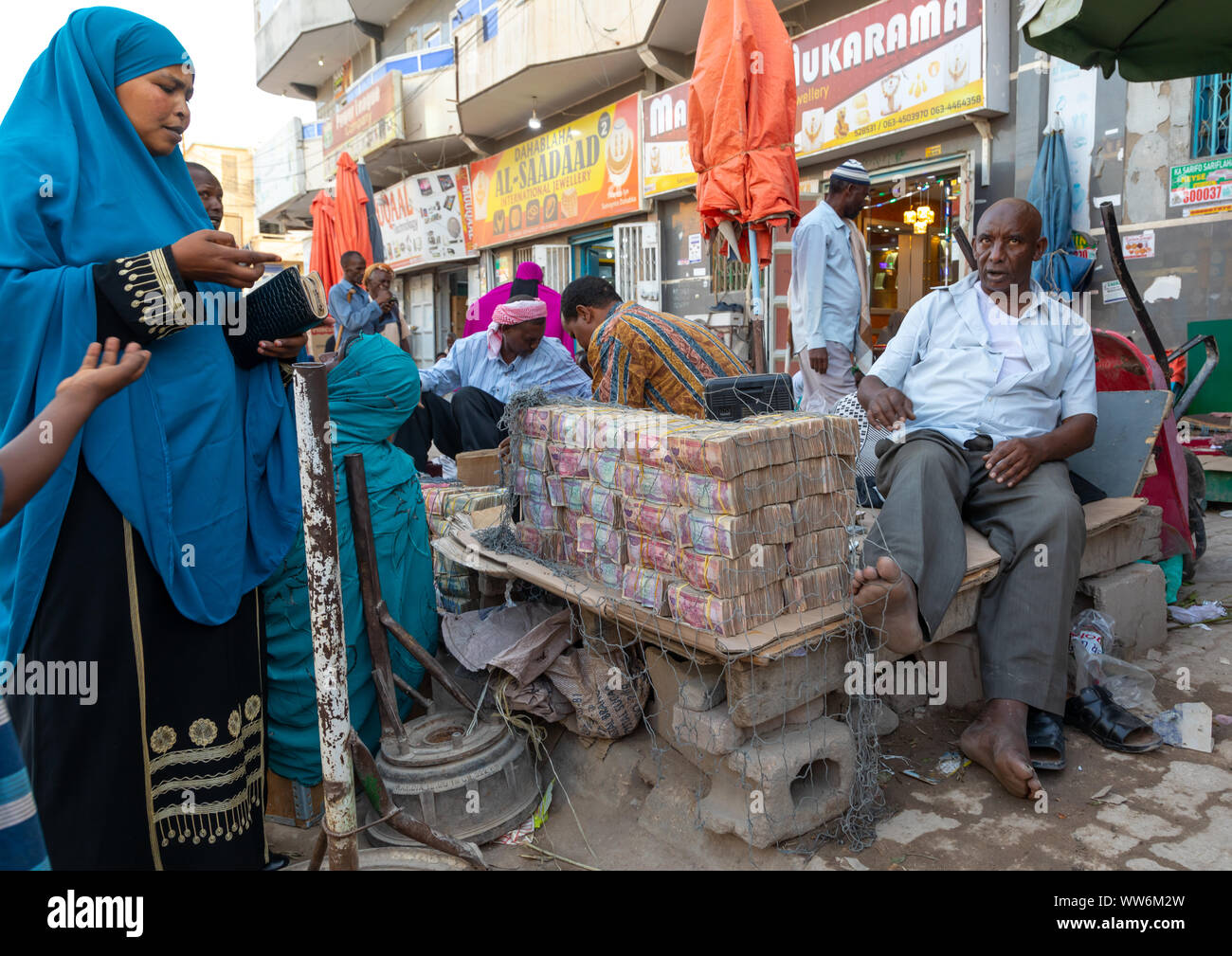 Wads of money changer on his stall , Woqooyi Galbeed region, Hargeisa ...