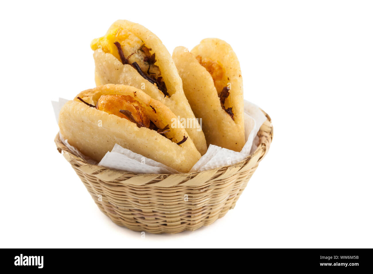 Arepa de huevo. Traditional Colombian fried arepa filled with egg and ...