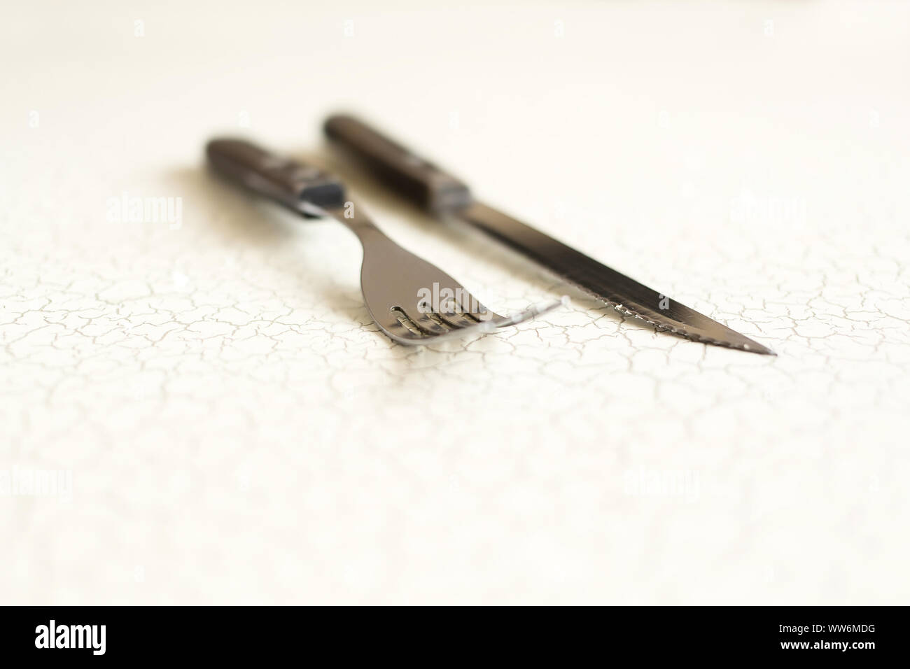 Cutlery. Composition of cutlery Two knife and fork on the table ...