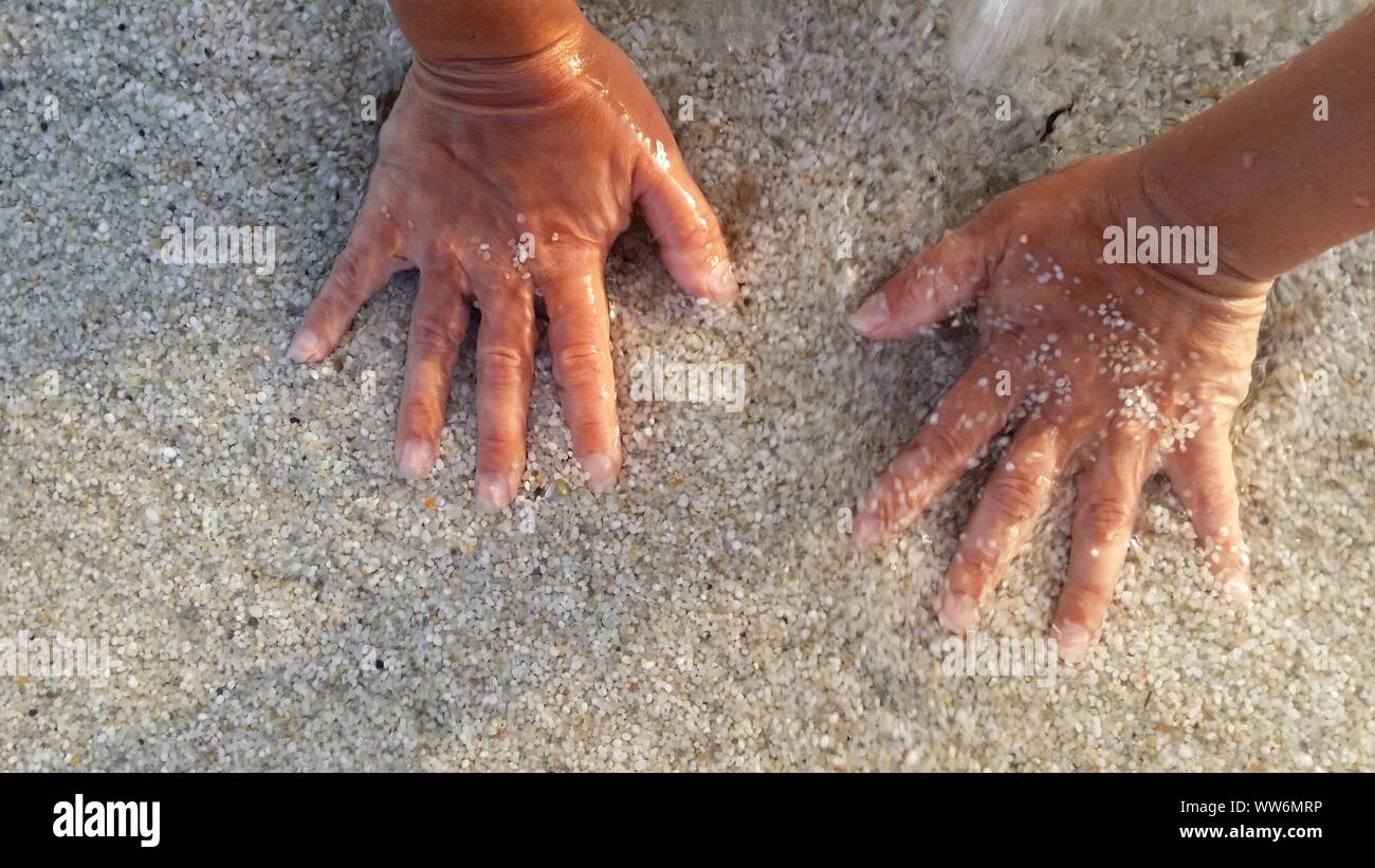 photos of my hands in the sea water this summer Stock Photo - Alamy