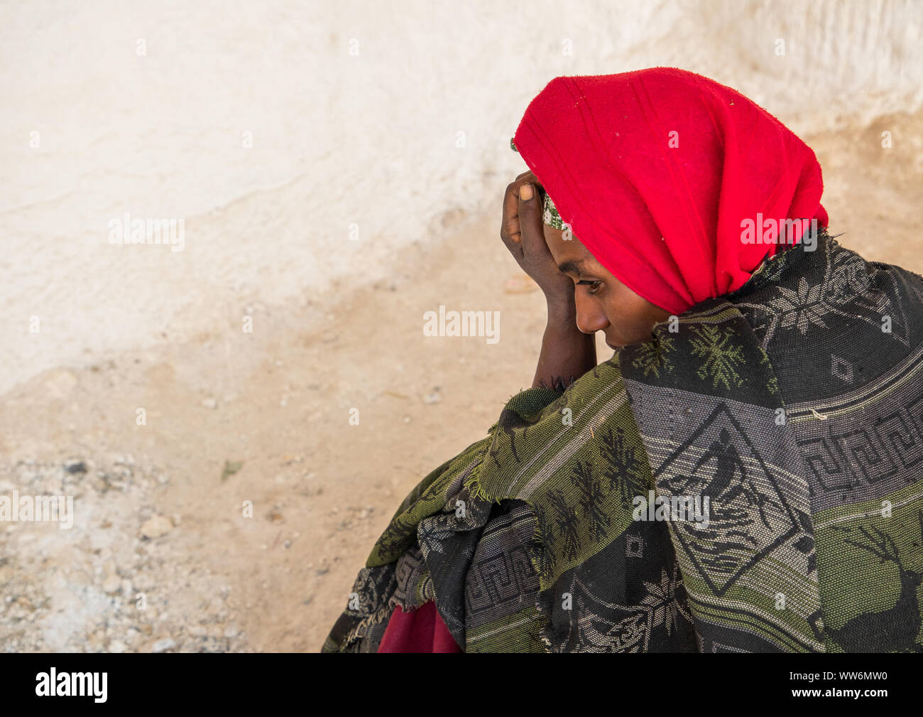 Oromo pilgrim woman praying in the shrine of sufi Sheikh Hussein ...