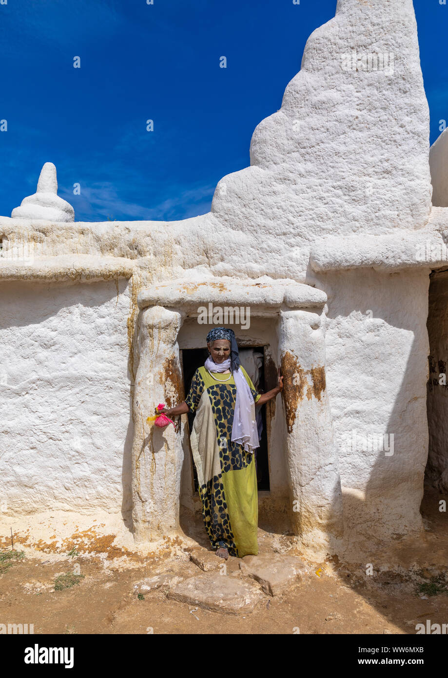 Oromo pilgrim woman in the shrine which hosts the tomb of sufi Sheikh ...