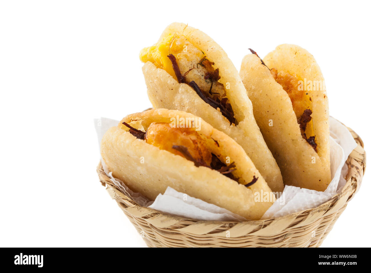 Arepa de huevo. Traditional Colombian fried arepa filled with egg and ...
