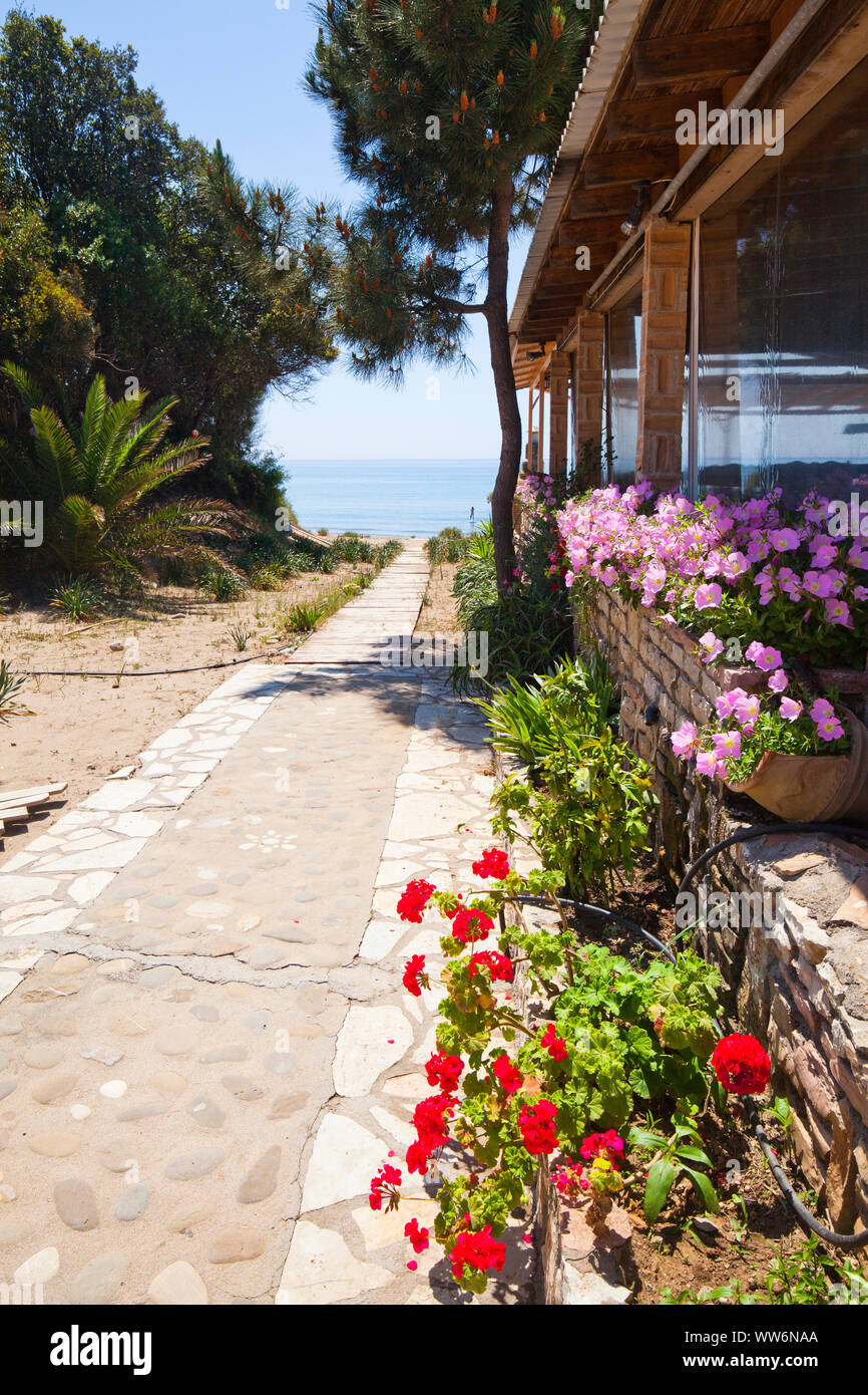 Path to the beach at the tourist restaurant in Greece Stock Photo - Alamy