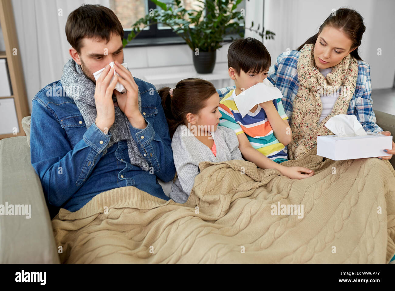 ill family with children having flu at home Stock Photo - Alamy