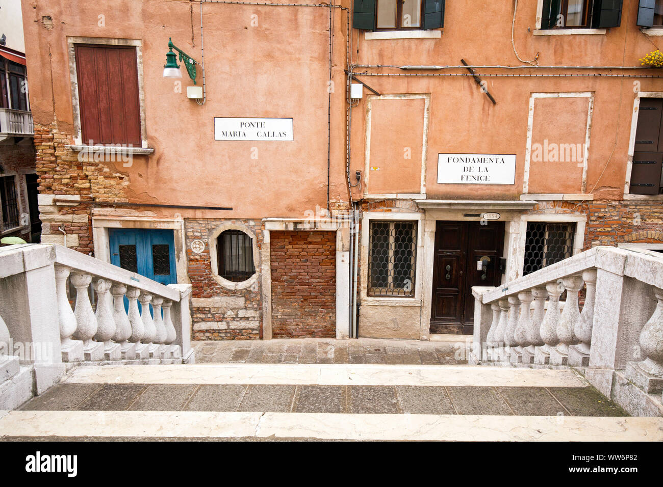 stone bridge in front of a faded house facade in Venice Stock Photo - Alamy