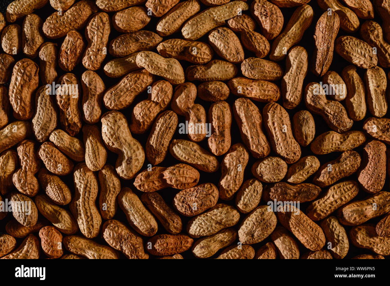 Peanut in a shell texture, background of peanuts Stock Photo - Alamy