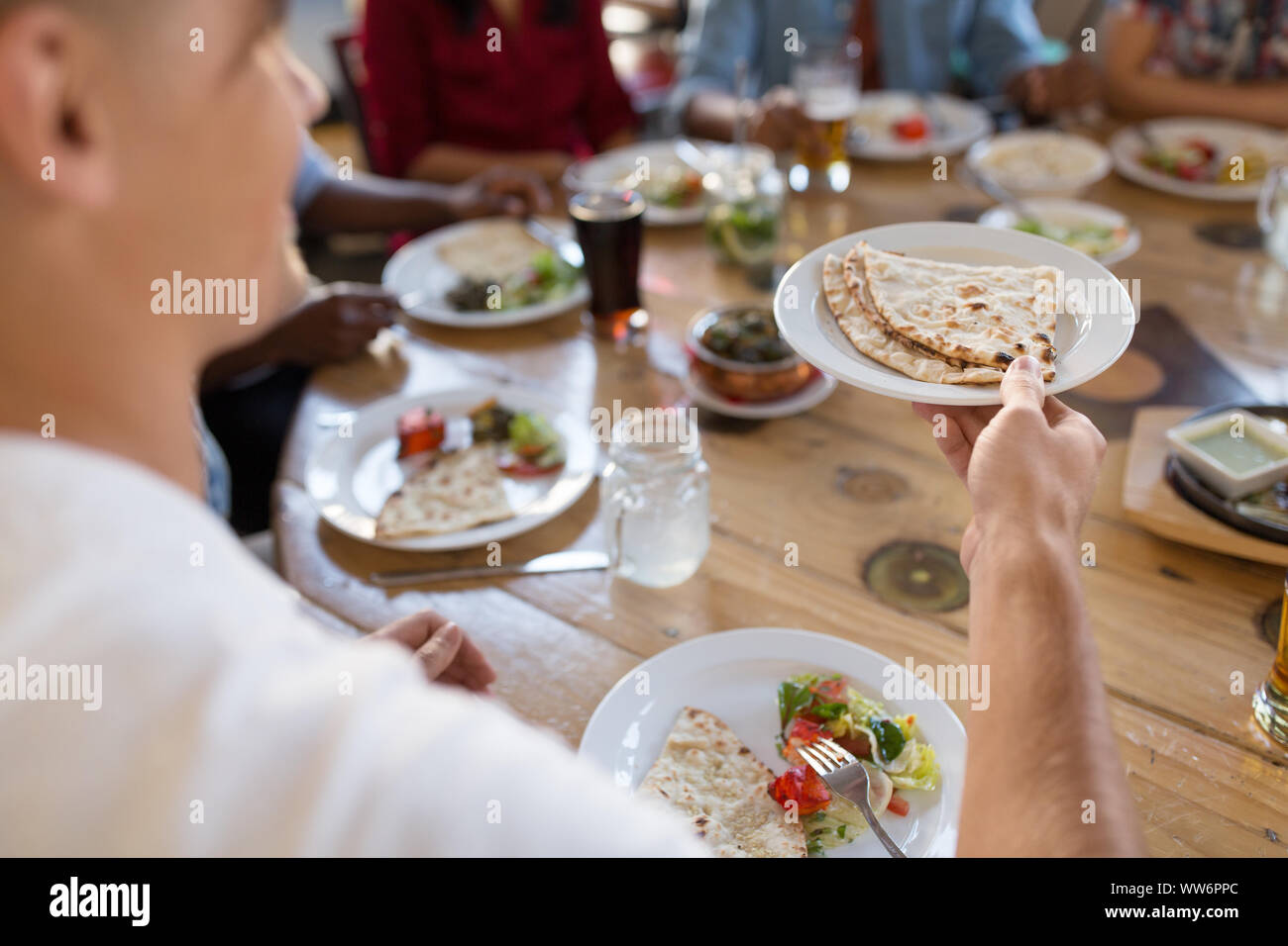 Indian sharing bread hi-res stock photography and images - Alamy