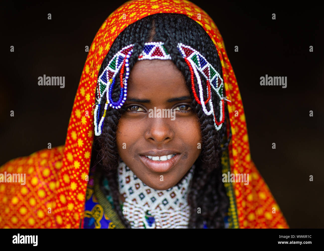 Portrait of an Afar tribe girl with beaded headwear, Central region ...