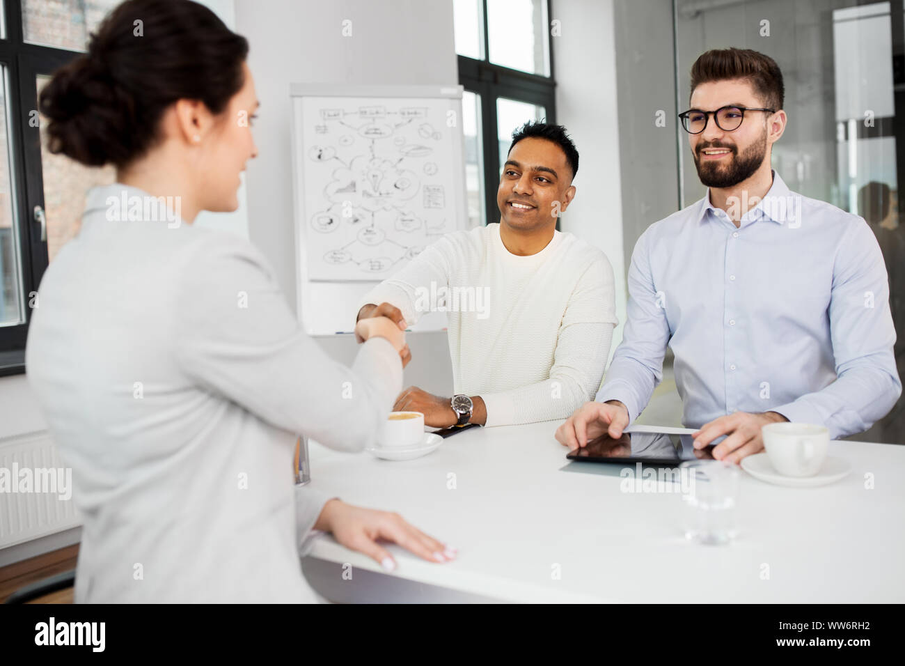 recruiters having interview with employee Stock Photo - Alamy