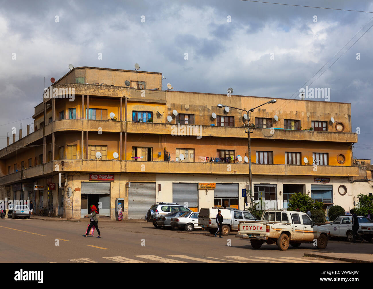 Exterior of old art deco style building from the italian colonial times ...