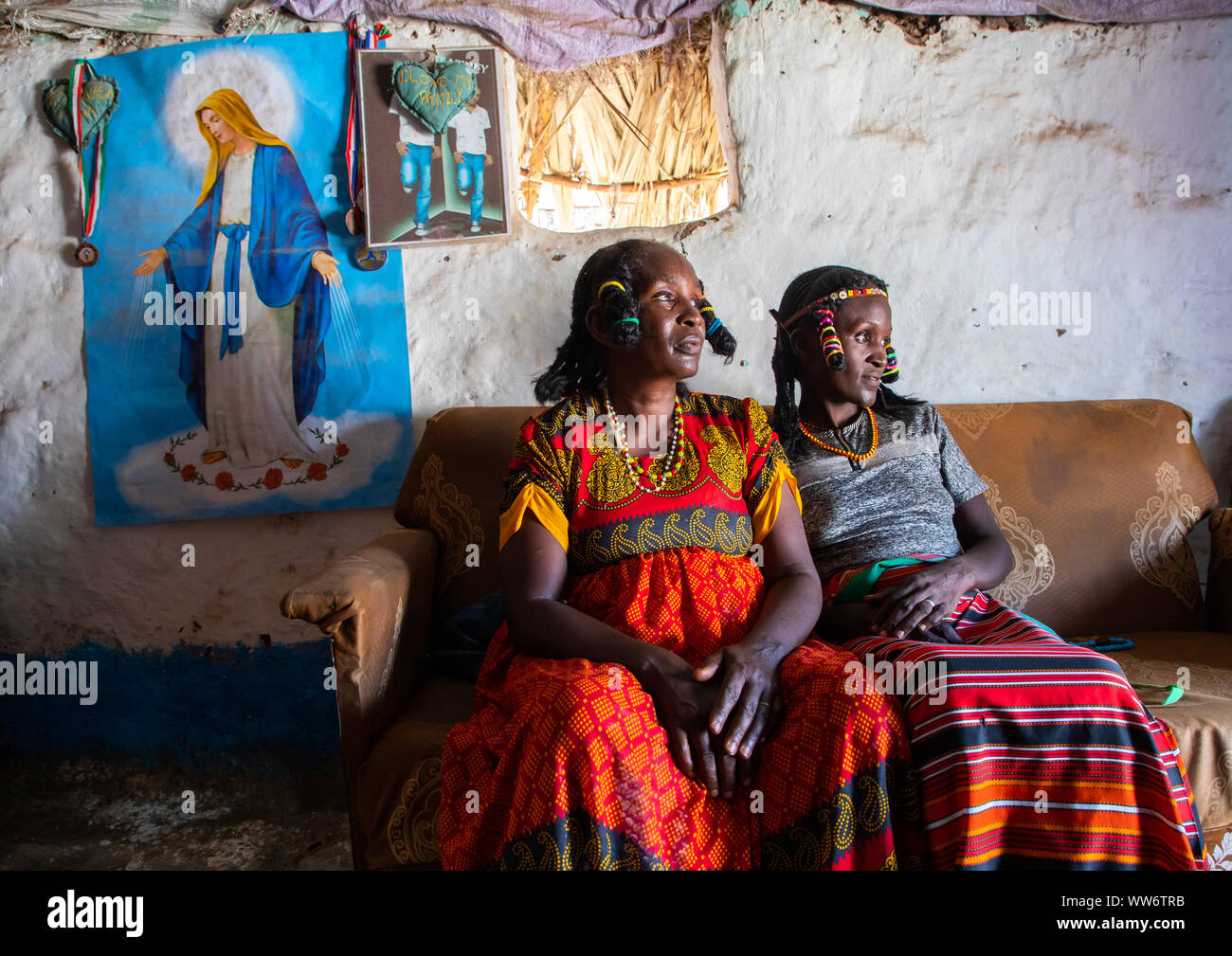 Portrait of Kunama tribe women with traditional hairstyles in front of ...