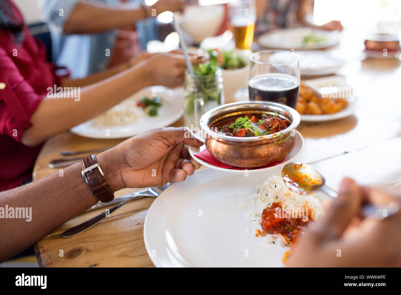 Man eating curry hi-res stock photography and images - Alamy